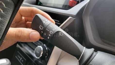 Wiper Control Button An Asian Man S Hand Is Operating The Wiper Switch