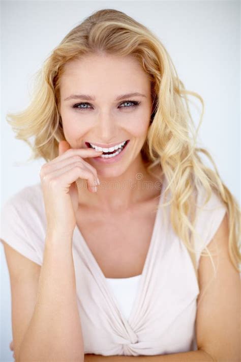 Coy Young Beauty Pretty Young Woman Biting Her Finger In A Flirty