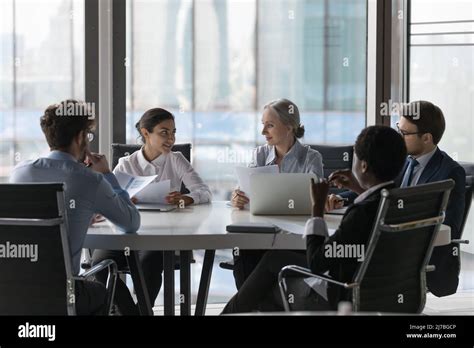 Multiethnic Business Team Working Together Brainstorming Discussing