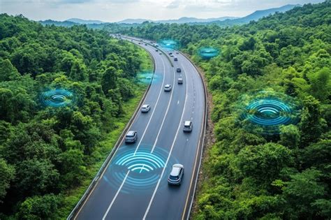 Autonomous Vehicles Driving On A Forested Highway Demonstrating The