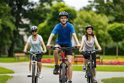Urban Biking Three People Riding Bikes In City Canadian Cycling Magazine