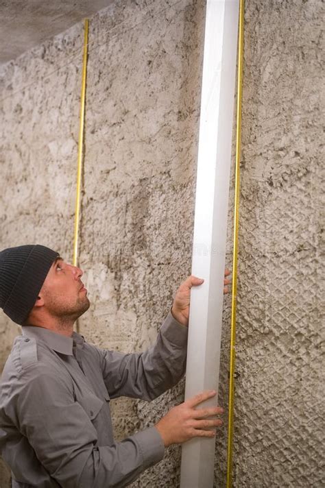 Metal Guide Beacons Are Attached To The Wall The Master Checks The