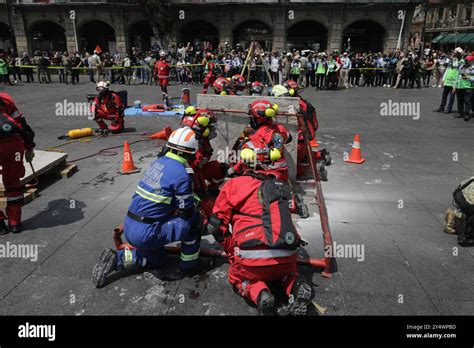 Non Exclusive Rescuers And Firefighters Simulate An Accident Caused By The Collapse Of A