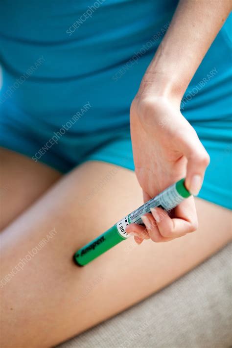 Woman Using Epipen Stock Image C Science Photo Library