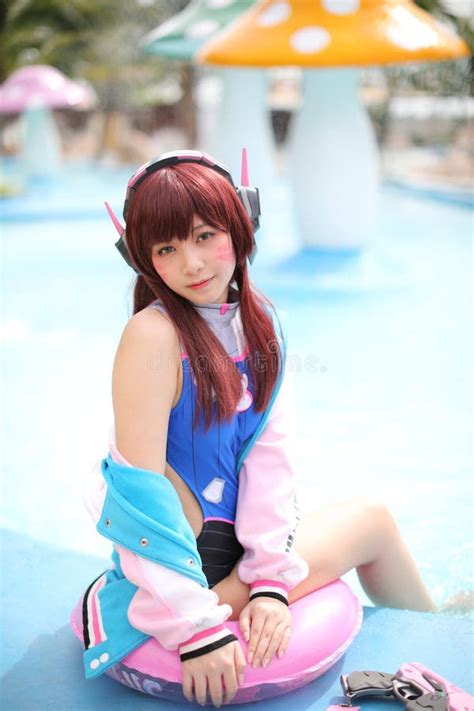 Portrait Of Japan Anime Cosplay Girl With Swim Suit At Swimming Pool