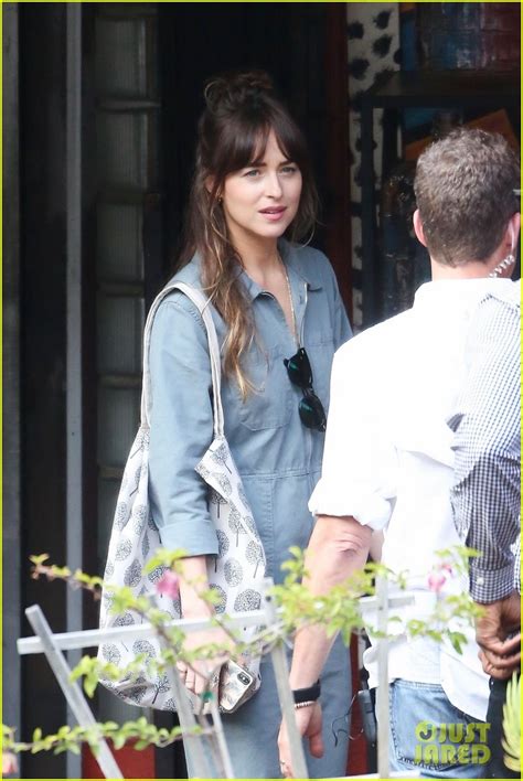 Photo Dakota Johnson Continues Filming Covers Chris Martin Split