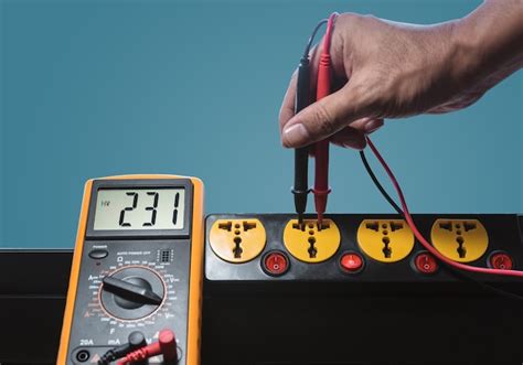 Premium Photo Measure The Ac Voltage Of 230 Volts From The Power Outlet With A Digital Meter