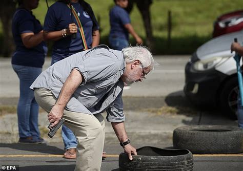 Motorist Who Shot Dead Two Environmental Protesters Blocking A Road Is