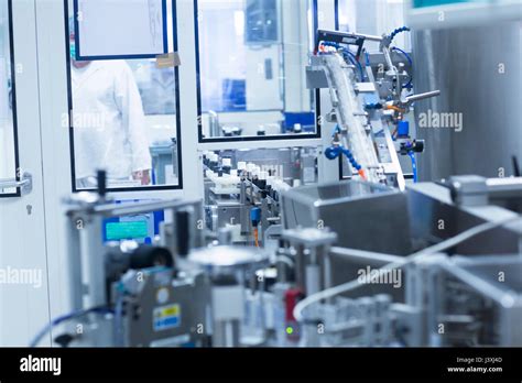 Machine Sorting Bottles On Production Line In Pharmaceutical Plant Stock Photo Alamy