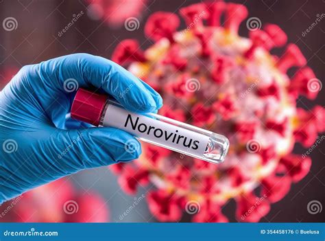 Gloved Hand Holding A Test Tube Labeled Norovirus Against A Background
