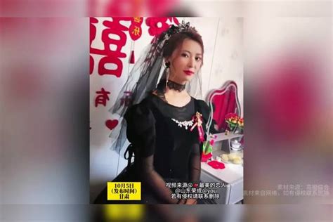 大喜之日新娘身穿黑色婚纱十分个性美丽 吸引了宾客们眼球