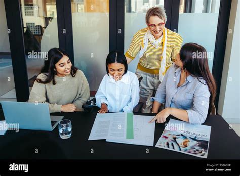 College Students And Their Professor Actively Participate In A Classroom Learning Session College Students And Their Professor Actively Participate In A Classroom Learning Session