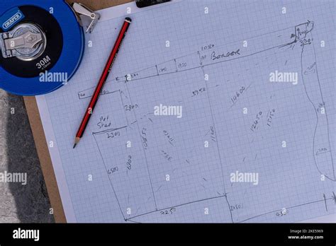 Making A Plan Of A Garden Using Tape Measure Graph Paper And A Pencil