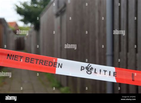 Police Lint To Block Crime Scene In Rotterdam With Dutch Text Politie