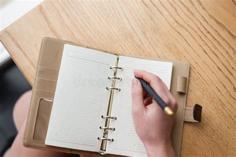 Keeping A Diary Record Important Dates And Typed In A Notebook Stock
