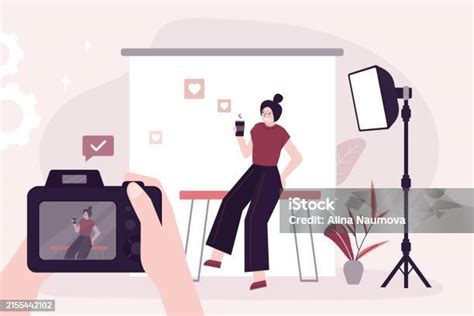 전문 사진 촬영 뷰티 여성 모델은 스튜디오에서 잡지 또는 배너를 위해 사진 작가를 위해 포즈를 취합니다 배경에 세련된 소녀 창의적인 예술가는 카메라를 사용하고 사진을