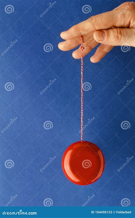 Playing Yoyo Over Blue Background Stock Image Image Of Blue String 104490123