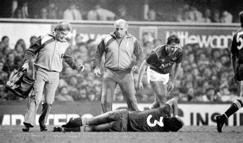 The Football Liverpool Assistant Manager Ronnie Moran And Coach Roy Evans Rush To Aid Jim