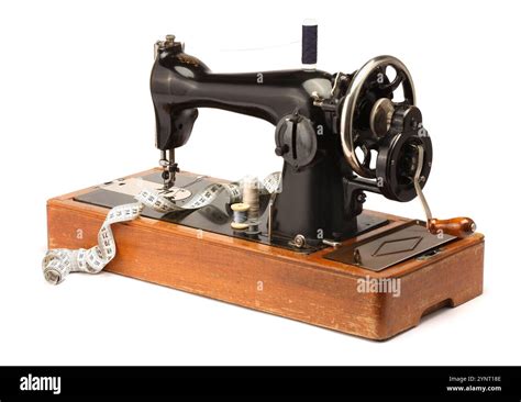 Sewing Machine Measuring Tape And Spools Of Threads Isolated On White