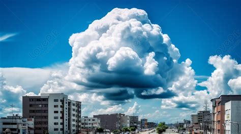 City Is Seen In The Sky With A Huge Cloud Behind Cloud City Backgrounds Seen Backgrounds
