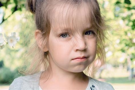 Premium Photo Close Up Portrait Of Girl Making Face