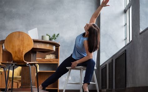 Desk Yoga Poses For A Reinvigorating Work Stretch