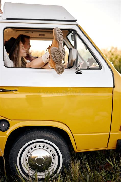Beautiful Woman With Legs Peeped Out Of Window Of Yellow Retro Vintage