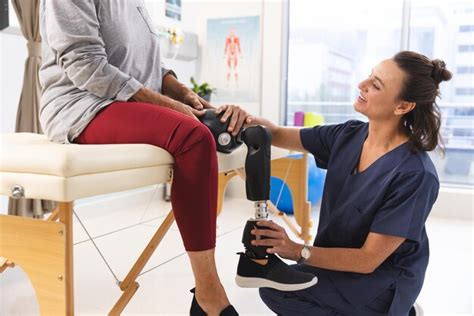 Premium Photo Caucasian Female Physiotherapist And Senior Woman With