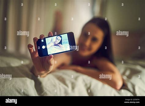 Best Selfie Ever A Young Woman Showing A Cellphone Selfie While Lying