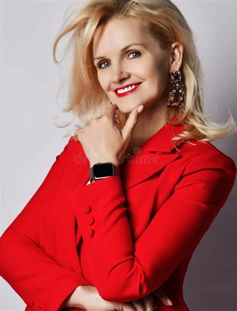 Portrait Of Young Beautiful Blond Smiling Woman In Stylish Elegant Deep