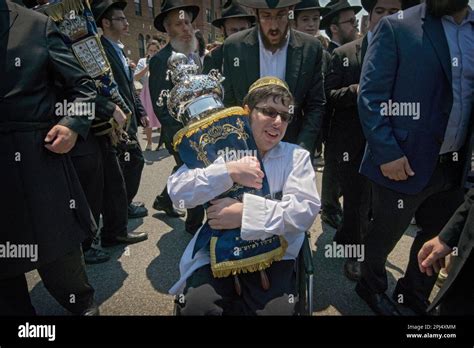 At A Celebration Of The Writing Of A New Torah A Young Jew In A