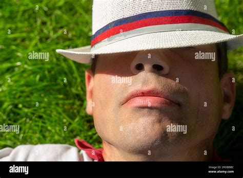 Symbol Image Siesta Man Lying In The Grass With Straw Hat Model