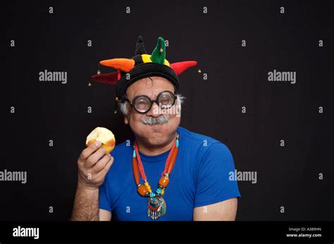 Man With Apple Stock Photo Alamy