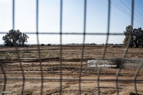 The Barbed Wire Perimeter Fence Of The Nir Oz Kibbutz Faces Directly News Photo Getty Images