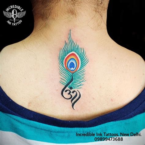 Peacock Feather Tattoo With Om Butterfly Tattoos On Arm Hand And