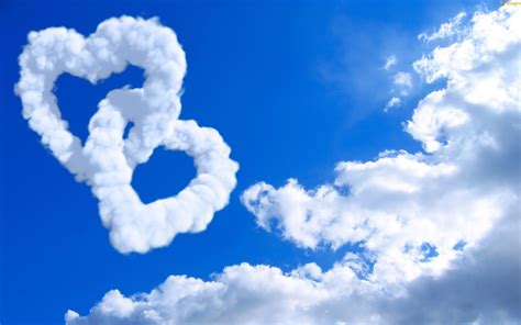 Les petites images d Amour du net Deux coeurs entrelacés dans le ciel