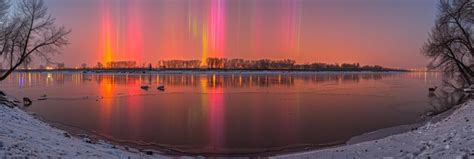 The Stunning Aurora Borealis Reflects Beautifully In A Serene Lake