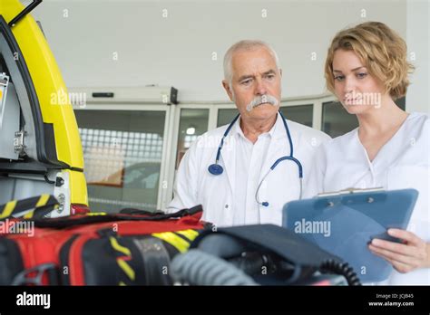 Ambulance People Checking Gear State In The Office Stock Photo Alamy