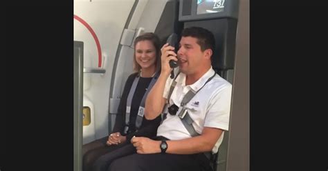 Flight Attendant Gives Instructions To Passengers As Looney Tunes