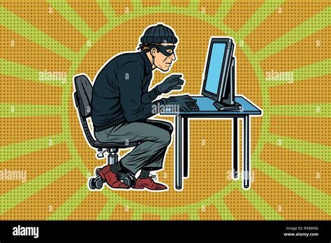 Hacker Sitting At The Computer Stock Photo Alamy