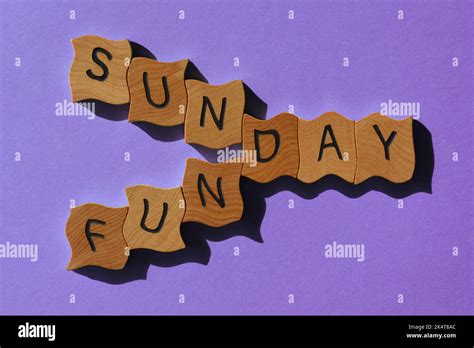Sunday Funday Words In Wooden Alphabet Letters Isolated On Blue