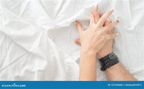Sensual Beautiful Young Couple Is Having Sex On Bed Female Hand