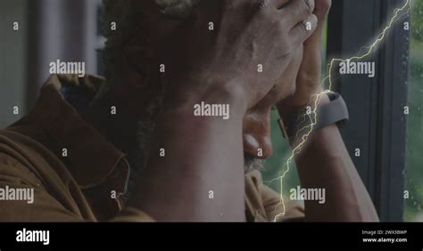Image Of Lightning Over Sad Senior African American Man Mental Health
