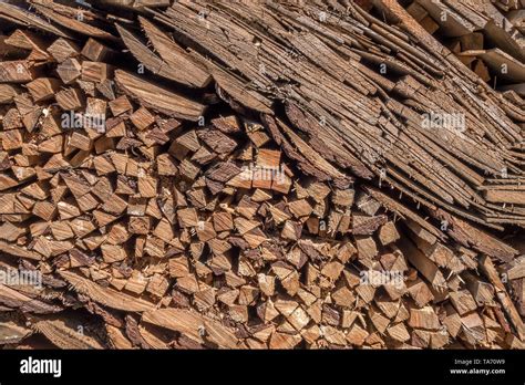 Firewood Cut And Stacked Neatly In Pile Outside Ready For Use In