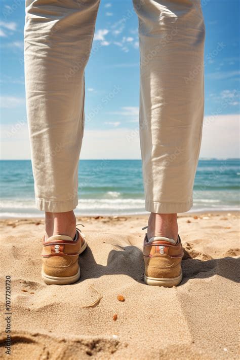 Footprints In The Sand Tranquil Image Of Male Feet Standing On Sandy