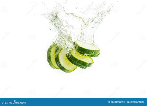 Sliced Cucumber Splashing Water Isolated On White Background Stock