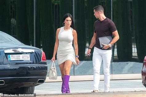 Georgina Rodriguez Wows In A Cream Dress And Purple Boots As She Steps