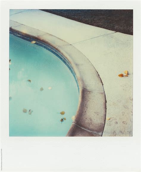 walkway along outer edge of swimming pool polariod sx 70 print by