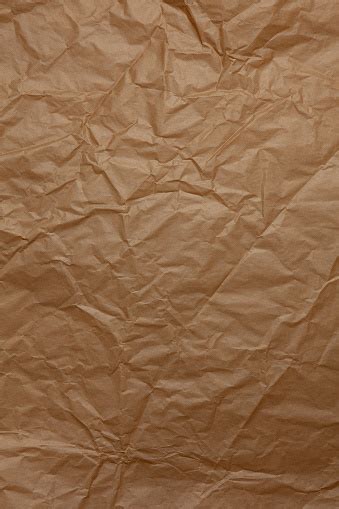추상 텍스처입니다 구겨진 공예 갈색 종이 배경입니다 텍스트의 공간을 복사합니다 수직 Diy 수공예품 학교로 돌아가기 생태학 플라스틱 무료 개념 모형 수확 플랫 레이 상단