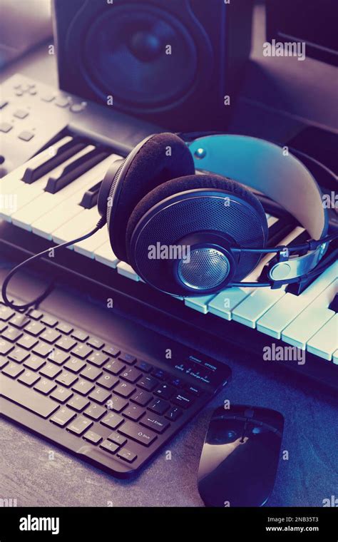 Keyboard Or Synthesizer With Headphones And Sound Card Computer Recording And Music Production